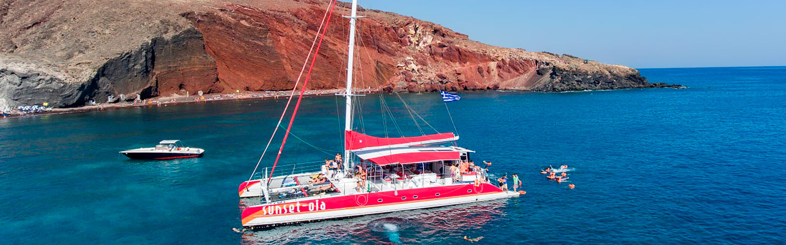 Morning cruise along the caldera by Ocean Voyager, the largest catamaran in Santorini ...